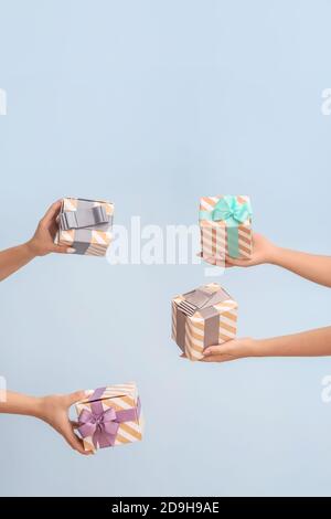 Packed gift box on blue background holidays concept Stock Photo - Alamy