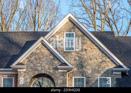 Double gable roof with attic vent or window Stock Photo - Alamy