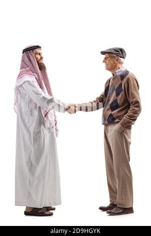 Saudi arab man shaking hands with punk isolated on white background ...