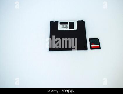 Old floppy disk and memory card on white background. Indoors Stock ...