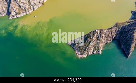 --File--Aerial view of the light green and dark green colors formed at ...