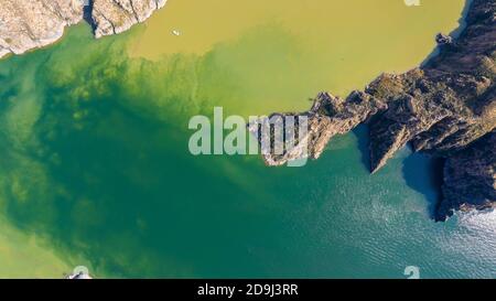 --File--Aerial view of the light green and dark green colors formed at ...