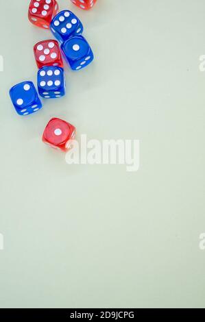 Vertical shot of red and blue dice isolated on white background Stock ...