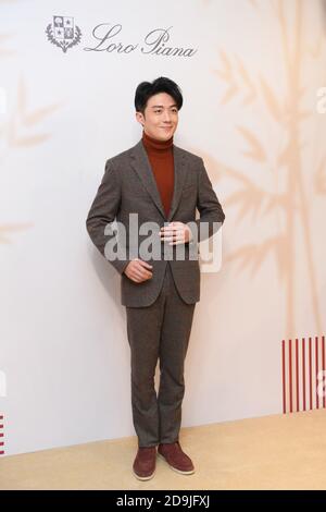 Chinese actor Li Zefeng poses for photos at the Loro Piana commercial ...