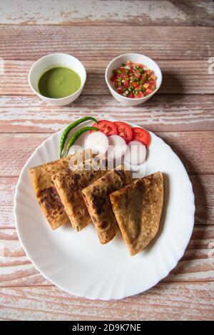 Aloo / Alu Paratha or Indian Potato stuffed Flatbread. Served with ...