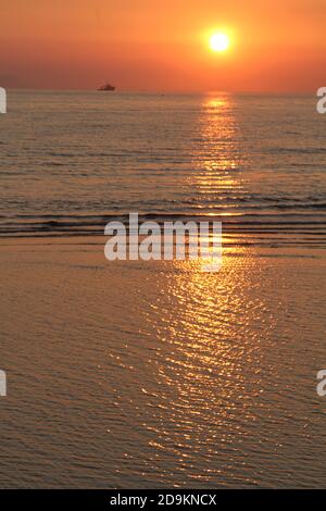 Prestwick, Ayrshire, Scotland, UK. The sun sets of the Firth of Clyde ...