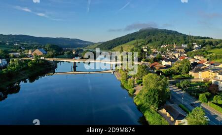 Remich Grand Duchy of Luxembourg Moselle River, swans, national flag ...