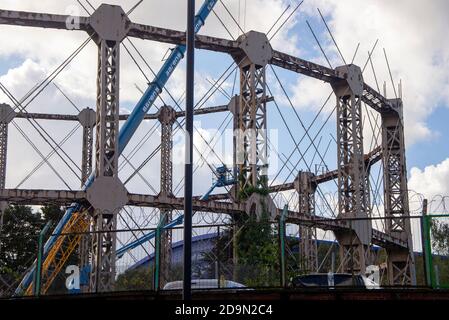 A demolition worker uses an oxy-acetylene torch to cut up a Victorian ...