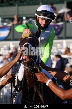 Jockey Florent Geroux celebrates after riding Monomoy Girl to victory ...