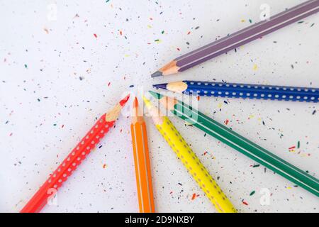 Crayons of various color on white background Stock Photo - Alamy