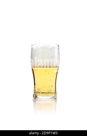 A vertical shot of a glass of bubbly beer with foam Stock Photo - Alamy