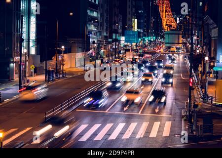 Traffic on the major city road in Tokyo with Tokyo Tower in the ...