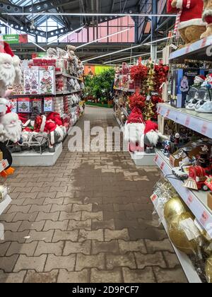 Inside flower and vintage decorations store. Shelves of flowerpots ...