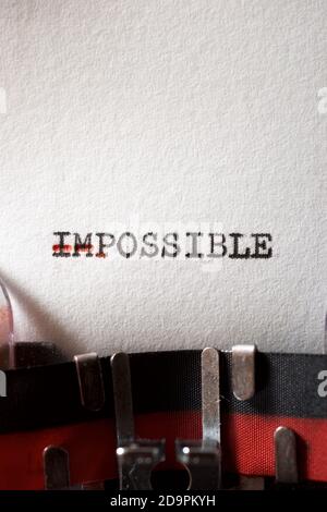 Make possible the impossible text written with a typewriter Stock Photo ...