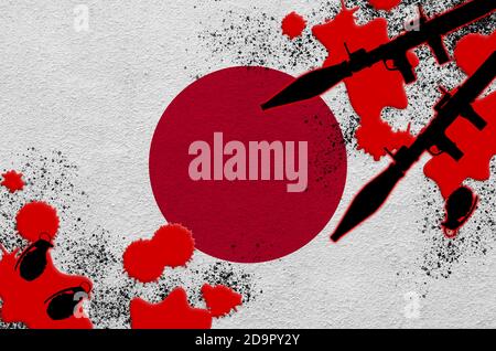 Japan flag and rocket launchers with grenades in blood. Concept for ...