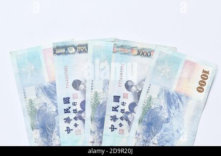 new Taiwan dollar or NT banknote on white background Stock Photo - Alamy
