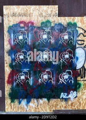 Seattle, USA. 12th Apr, 2020. Midday art on a boarded up business on ...