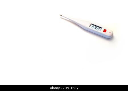 Digital fever thermometer showing the high temperature of a young girl ...