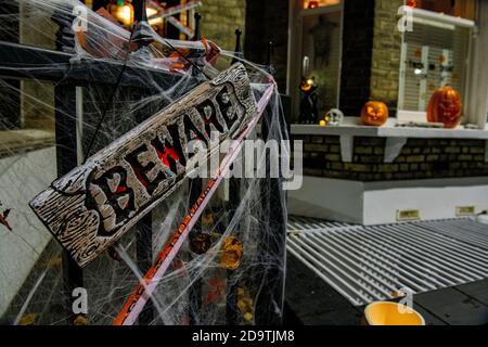 Warning sign for a haunted house Stock Photo - Alamy