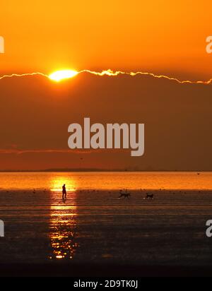 Heacham, UK. 04th Nov, 2020. Paragliders out for a flight along the ...