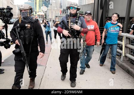 Atlanta, Georgia, USA. 8th Nov, 2020. A demonstrator holds up his ...