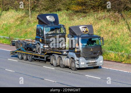 Heavy hgv Scania breakdown rescue tow truck moving a white Veolia ...