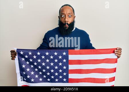Person holding USA flag lips shape card Stock Photo - Alamy