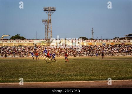 The national stadium Conakry with political slogans Vive La Revolution ...