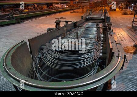 Wire rod, fittings in the production. industrial storehouse at the ...