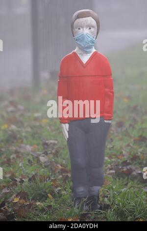 A bollard shaped like a child outside a school in Sheffield which Stock ...