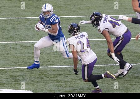 Baltimore Ravens cornerback Rock Ya-Sin runs with the ball during the ...