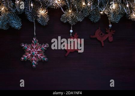Christmas garland on dark background Stock Photo - Alamy