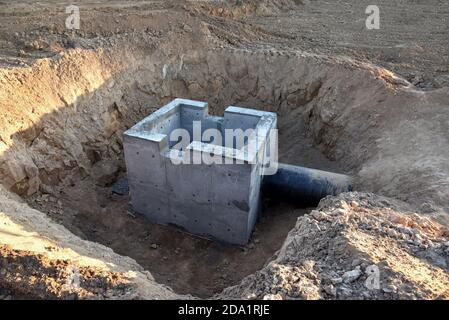 Construction of concrete stormwater pits, sanitary sewer system ...