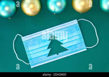 Christmas balls background and Medical protective masks. New Year 2021 ...