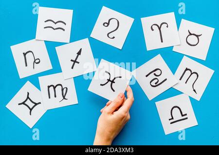 Flat lay of twelve zodiac signs. Horoscope concept, top view Stock ...