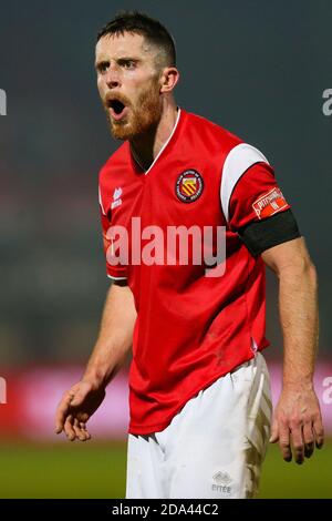 FC United of Manchester’s Adam Dodd and Doncaster Rovers’ Jason Lokilo ...