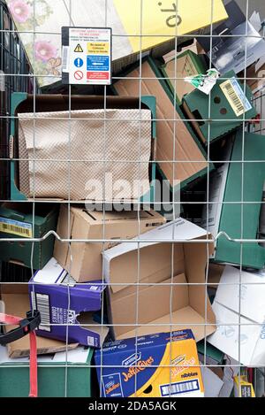Recyclable Cardboard boxes in roll cages or wire trollies outside ...