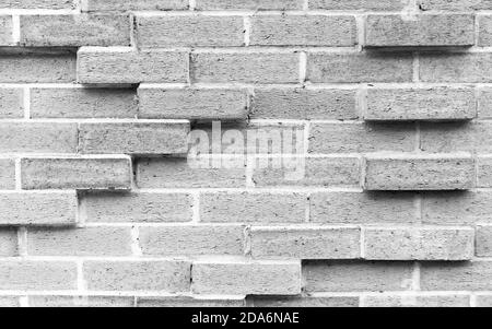 background of red textured relief brick. aged old stone wall or street ...
