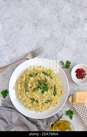 Spring food; Delicious risotto with asparagus and wild garlic Stock ...
