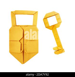 Origami paper golden key on a white background Stock Photo - Alamy