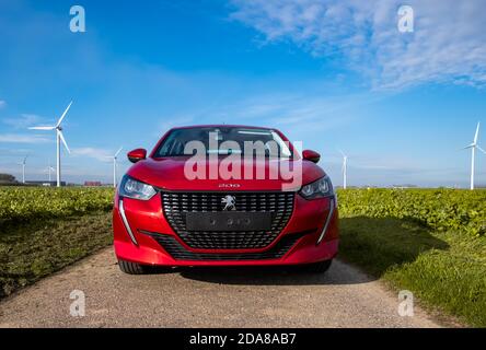 2020 Peugeot 208 in the metallic color rouge elixir Stock Photo - Alamy