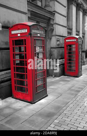 Selective colour of the Iconic red telephone boxes in Eden Place ...