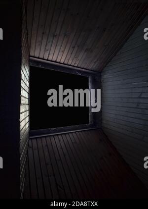 Old and dusty creepy wooden attic with roof framework structure of the ...