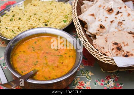 Indian flatbread tandoori roti and Malai kofta curry made in tandoor ...