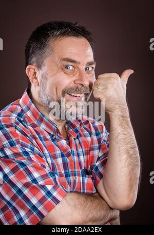 Successful man shows ok sigh Stock Photo - Alamy