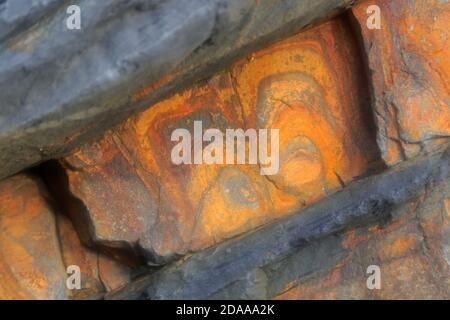Views of the orange coloured sedimentary rocks at Welcombe Mouth ...