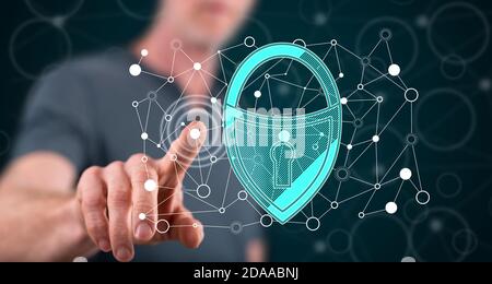 Man touching a network safety concept on a touch screen with his finger ...