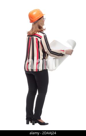 rear view . female architect reading a new drawing Stock Photo - Alamy