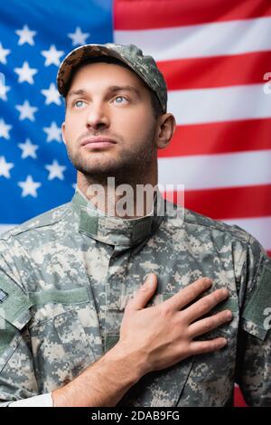 An American soldier man pledging allegiance in front of his country's ...