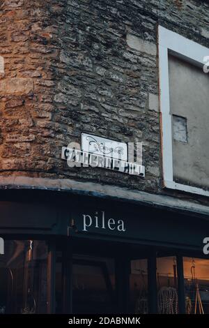 Catherine Street, Frome, street sign on a building with an old lamp and ...